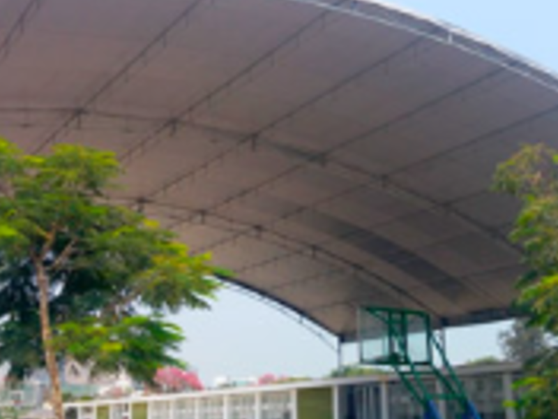 Techo parabólico para colegio Primavera Comas : Toldos Palomino | Construex